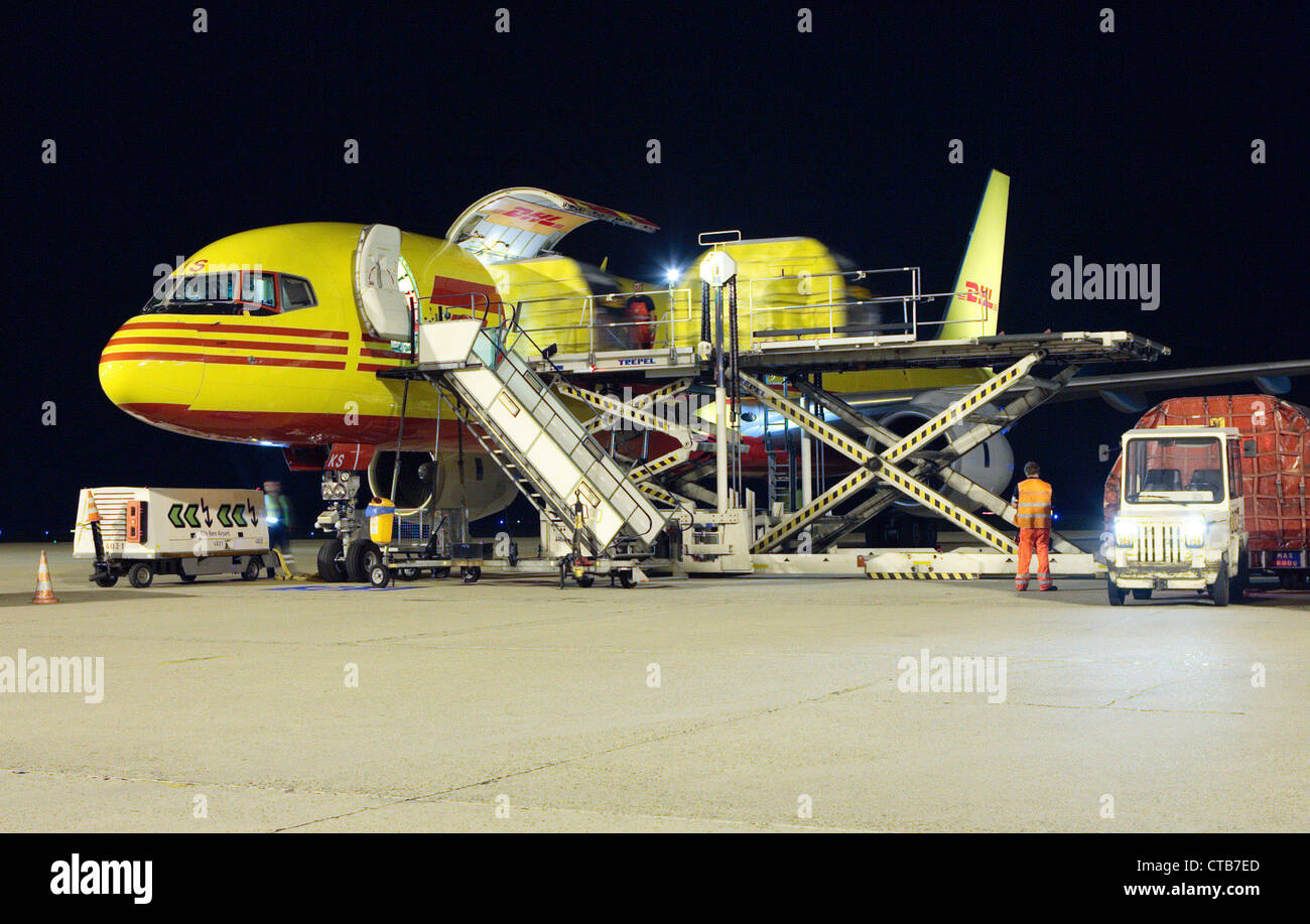 Night shift at the Cologne Bonn Airport, DHL cargo plane Stock Photo ...
