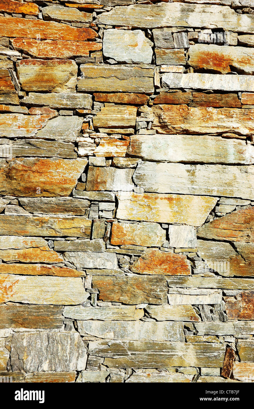 Detail of a colorful stone wall Stock Photo - Alamy