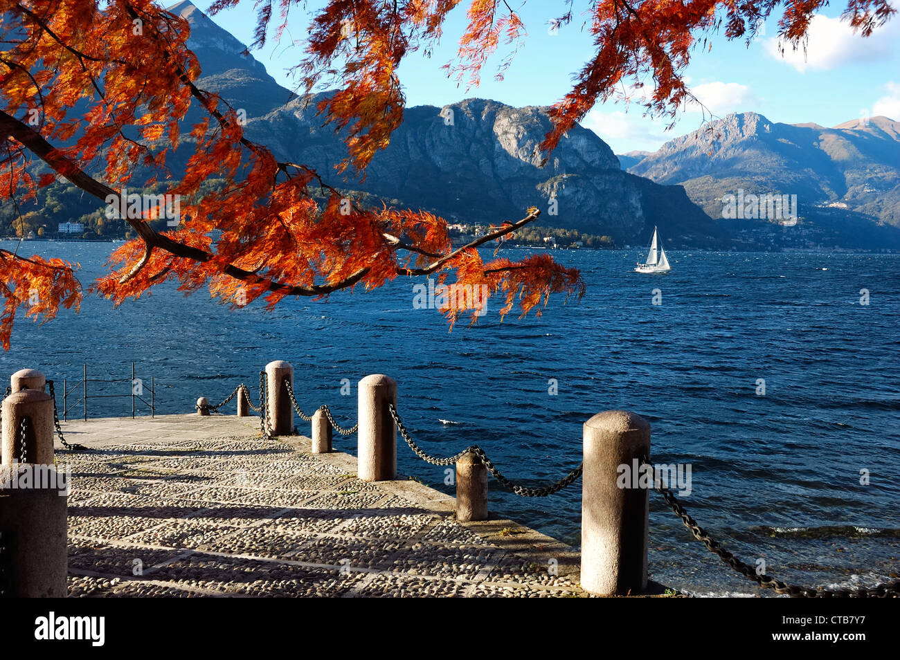 Small sailboat sailing in como lake hi-res stock photography and images ...