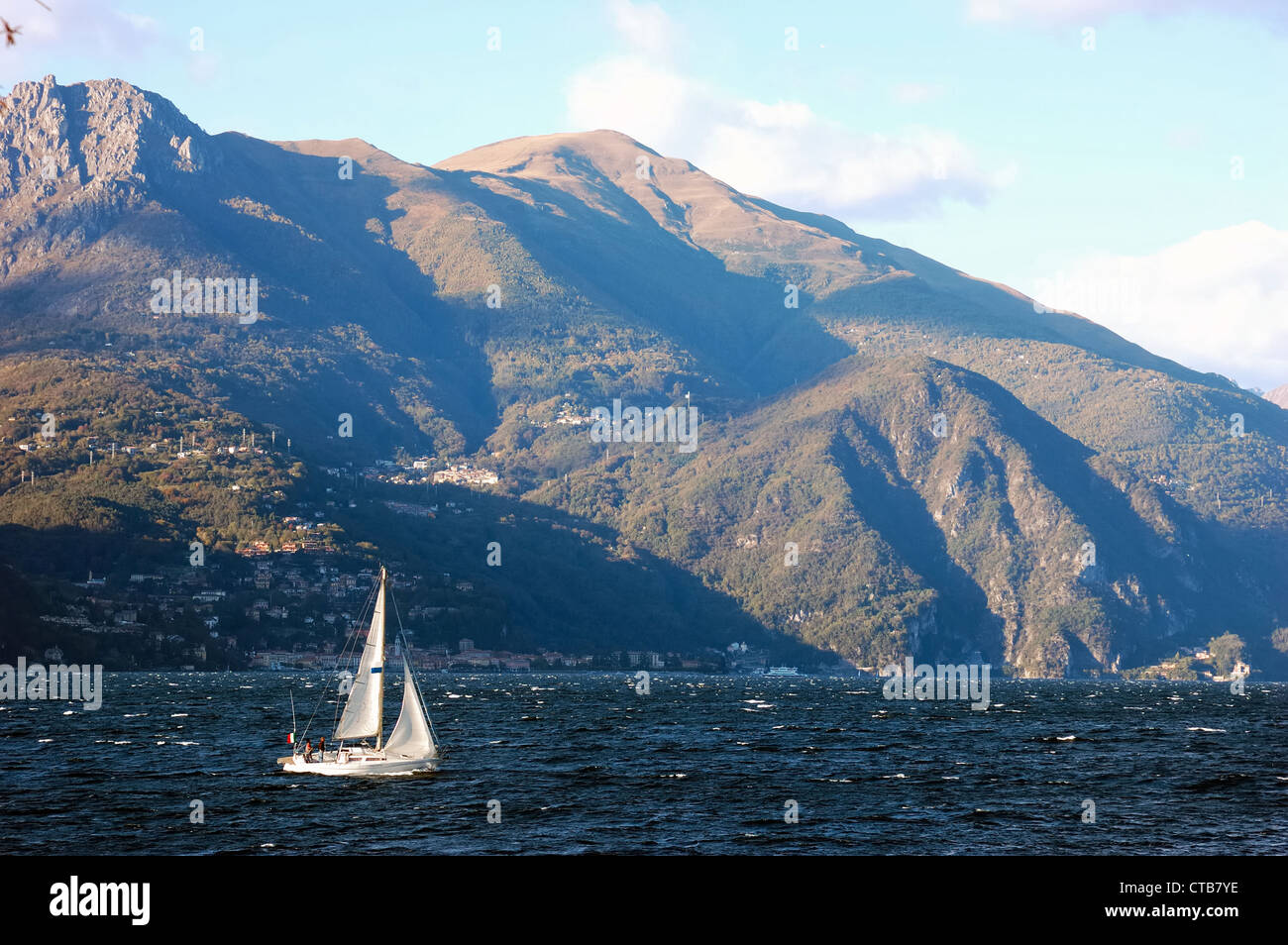 Small sailboat sailing in Como Lake, Italy Stock Photo - Alamy