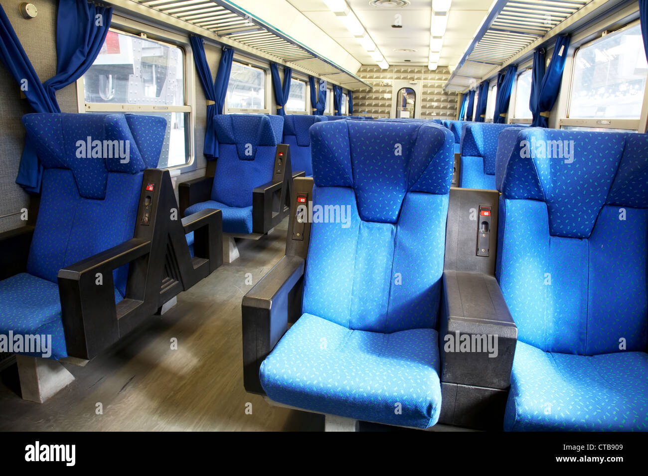 Vacant seats inside an empty passenger train. Horizontal frame Stock ...