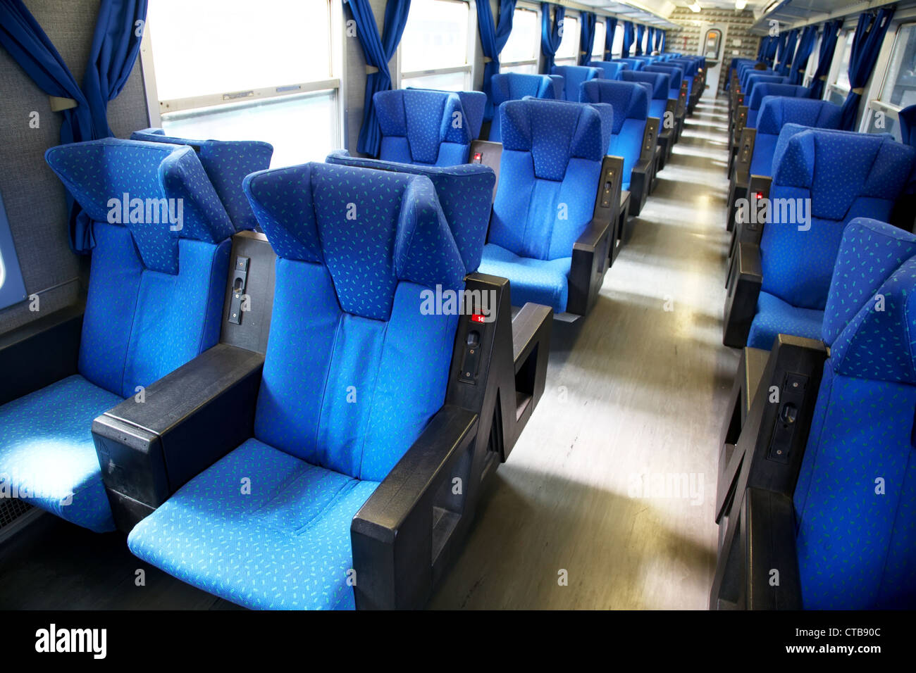 Vacant seats inside an empty passenger train. Horizontal frame Stock ...