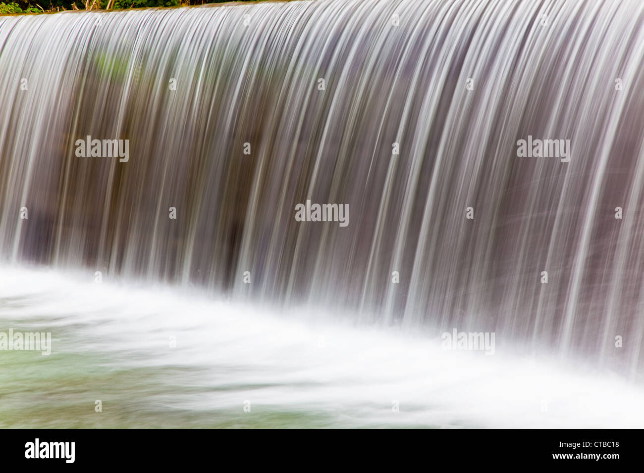 Side view of waterfall: water supply concept Stock Photo - Alamy
