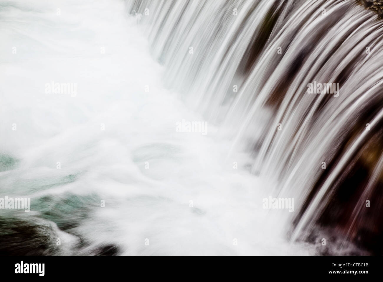 Side view of waterfall: water supply concept Stock Photo - Alamy