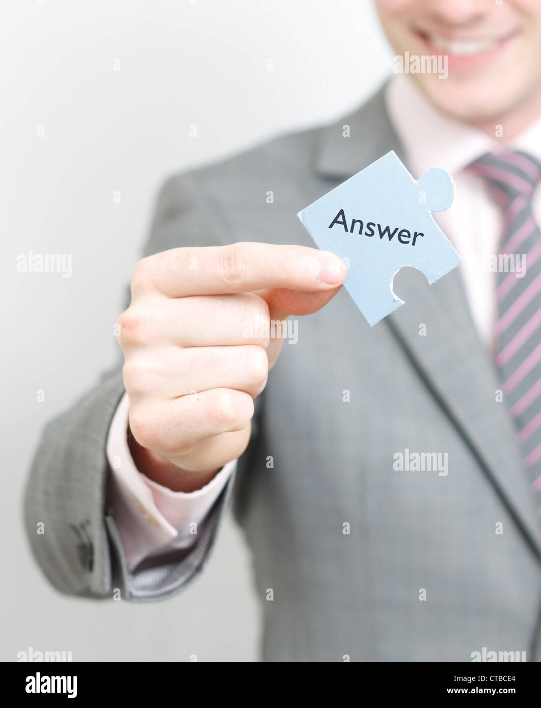 Solving the puzzle hi-res stock photography and images - Alamy