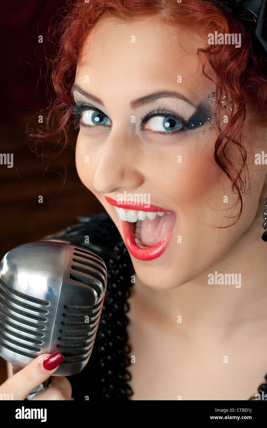 Vintage singing microphone hi-res stock photography and images - Alamy