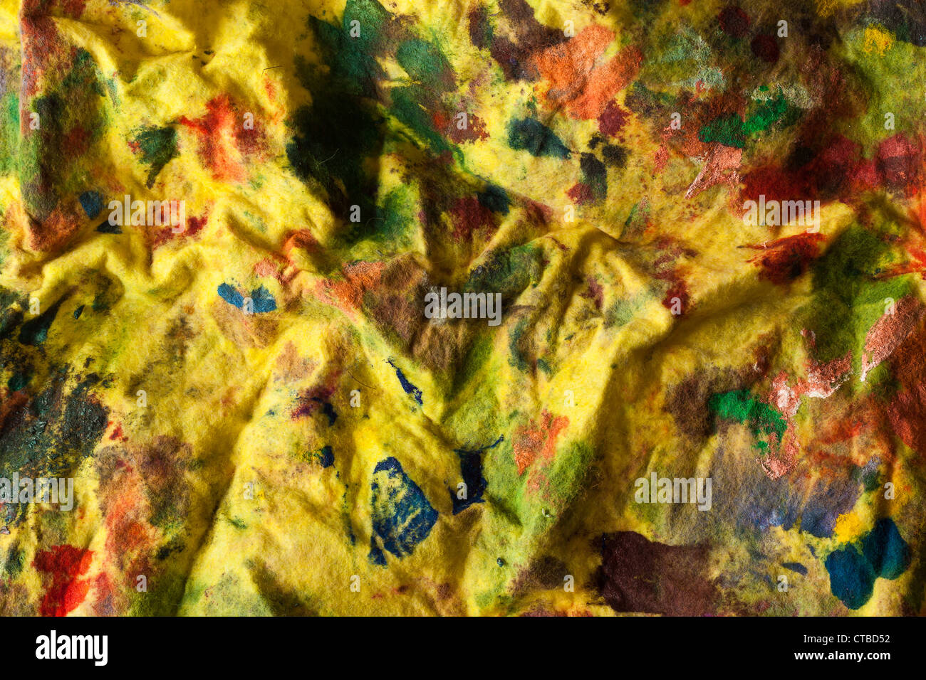 yellow stained fabric with paint background Stock Photo - Alamy
