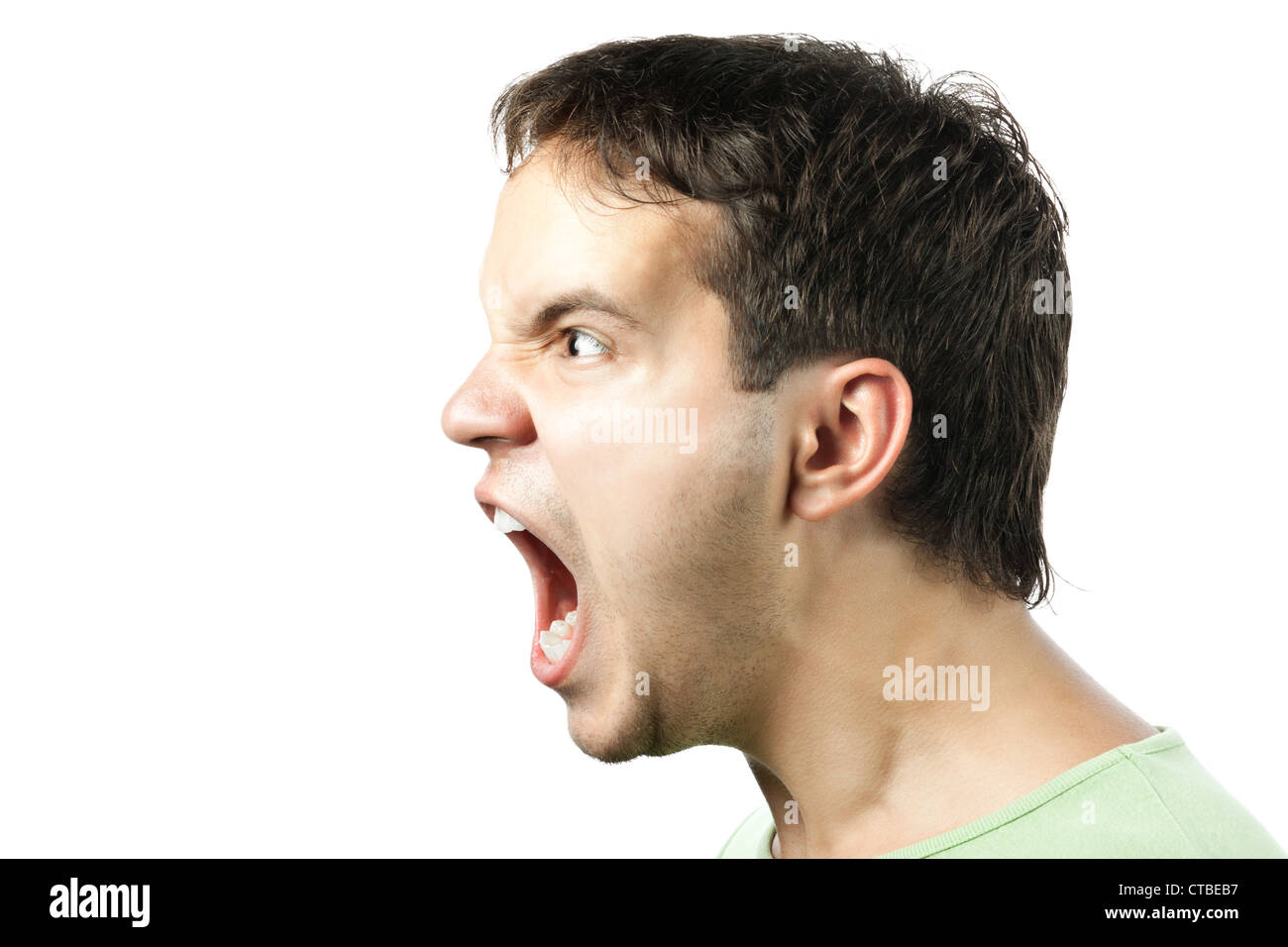 portrait of young angry man sreaming isolated on white background Stock ...