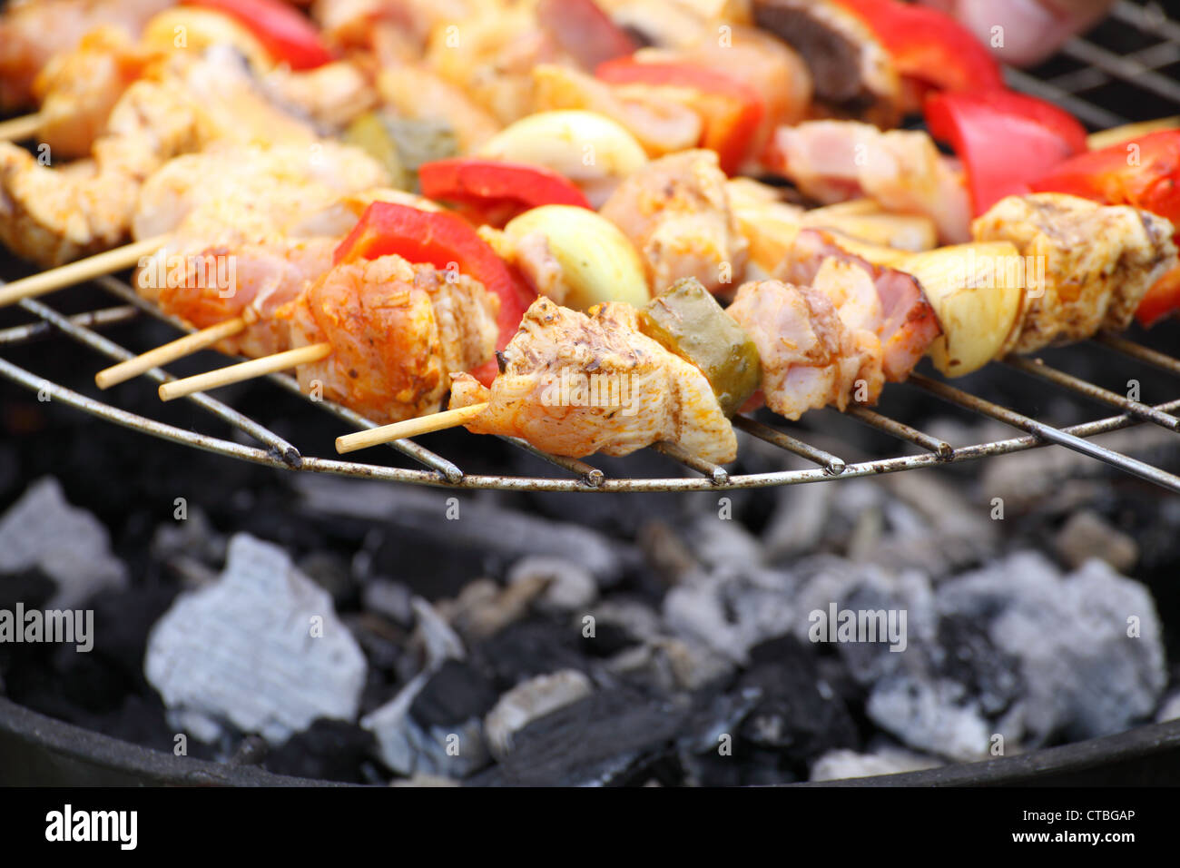 Barbecue with delicious grilled meat on grill BBQ Stock Photo - Alamy