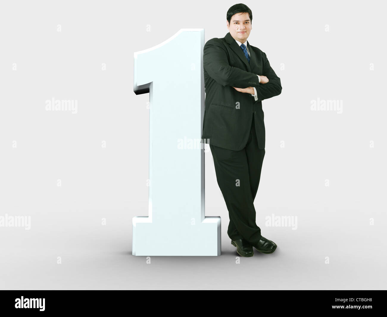 number one with a business man next to it Stock Photo - Alamy