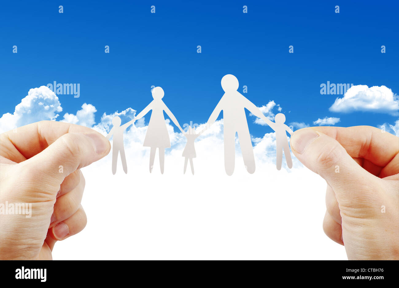 paper family in hands Stock Photo - Alamy