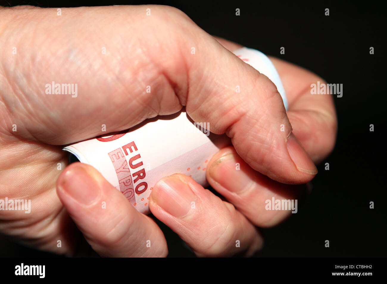 a hand holding euro notes Stock Photo - Alamy