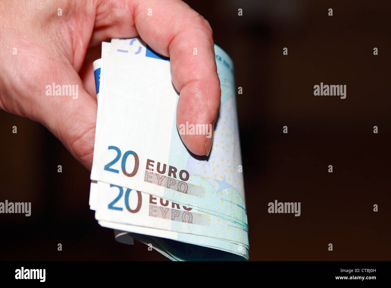 a hand holding euro notes Stock Photo - Alamy