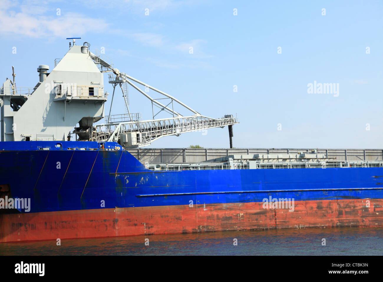 Loading coal into ship hi-res stock photography and images - Alamy