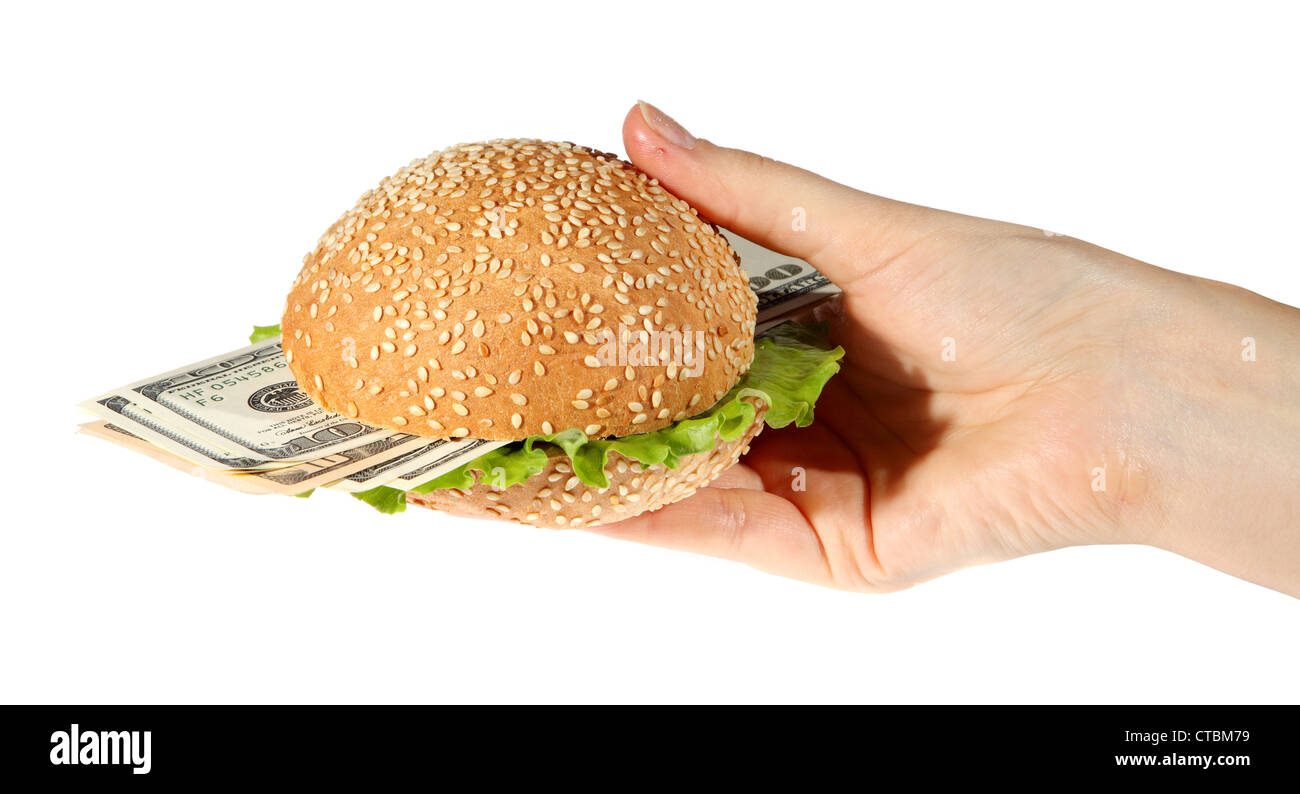 Hamburger with money in hand on white background Stock Photo - Alamy