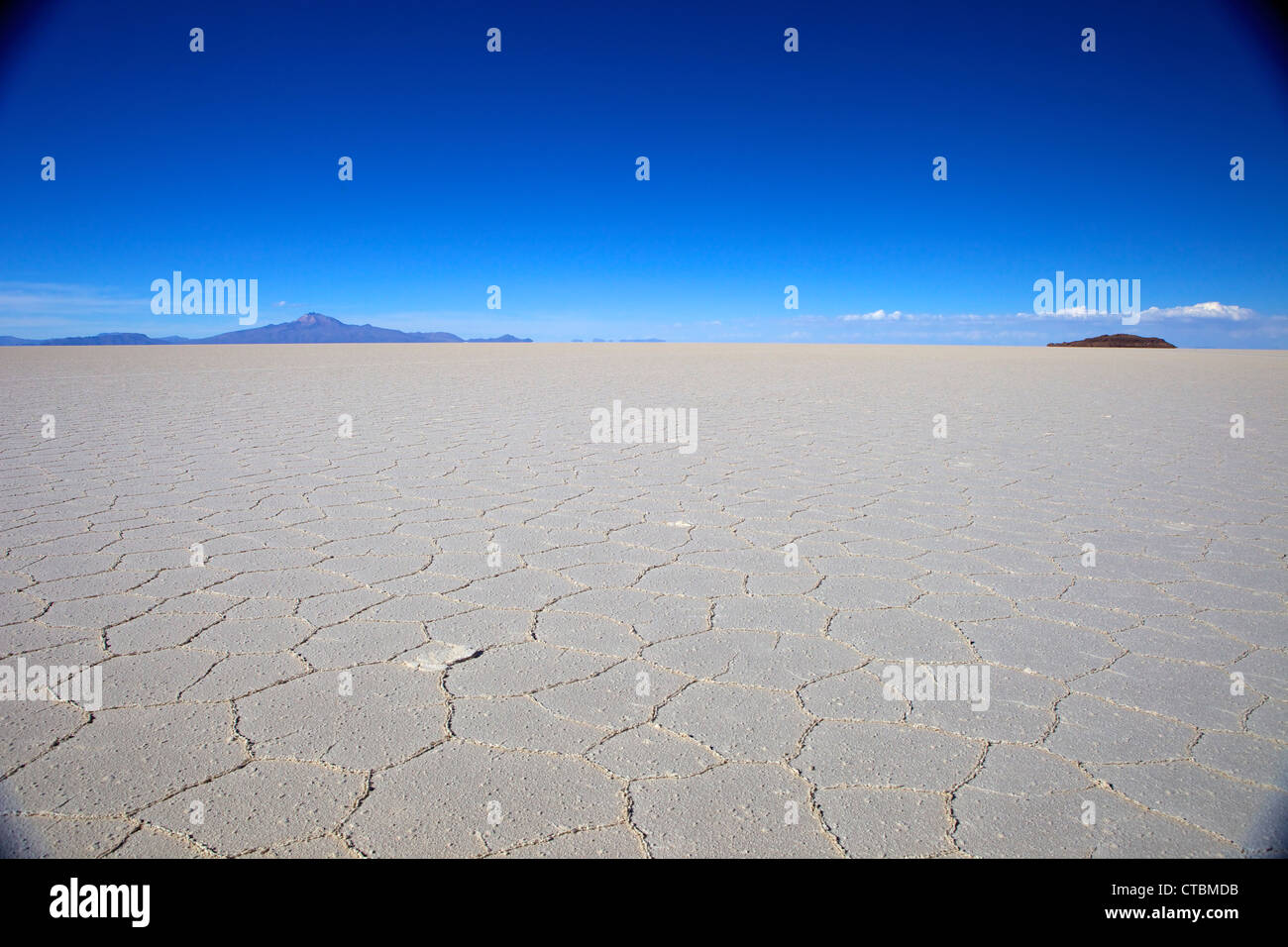 Salar de Uyuni, salt flat and Mt. Tunupa, Andes mountains in the ...