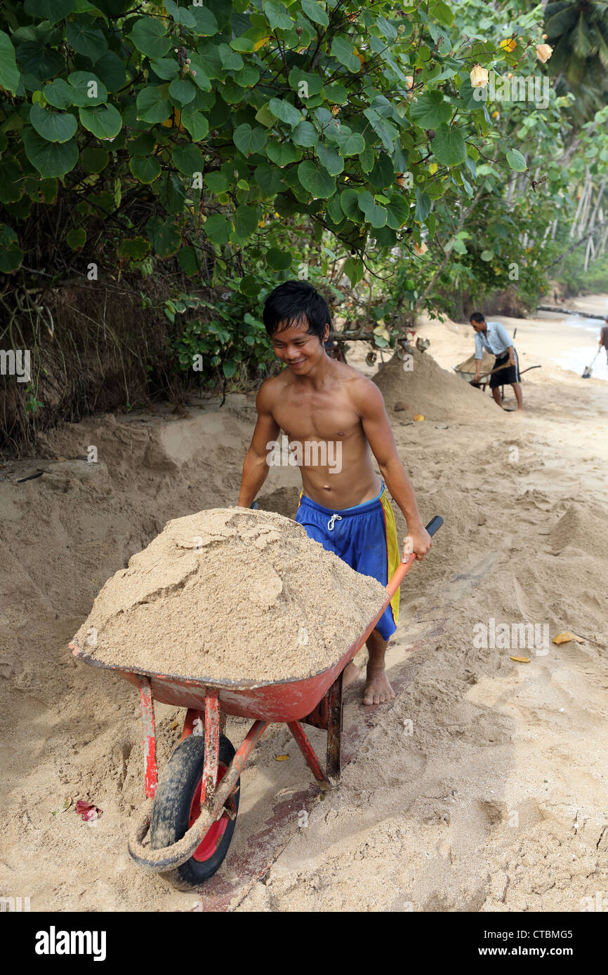 Pushing a heavy load hi-res stock photography and images - Alamy