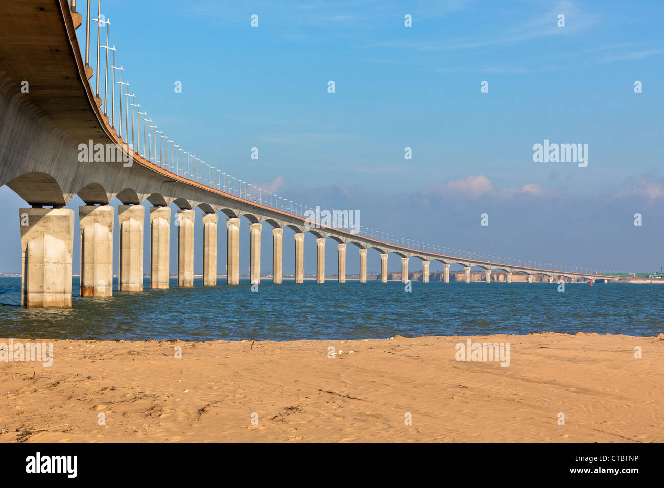 Curved Concrete Bridge over the water. Horizontal shot Stock Photo - Alamy