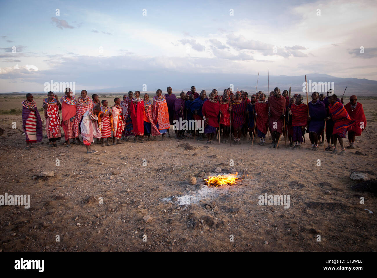 A Maasai Tribe gathers around the fire before a dance ceremony Stock ...