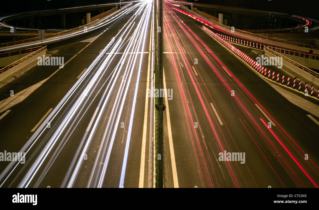 Highway light trails Stock Photo - Alamy