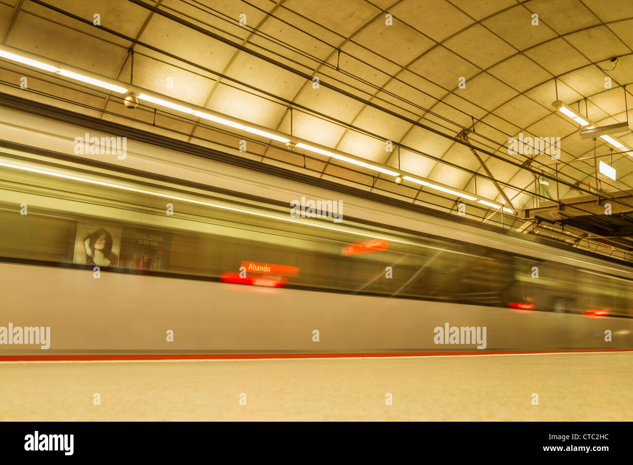 Train passing through Abando metro station in Bilbao, Basque Country ...