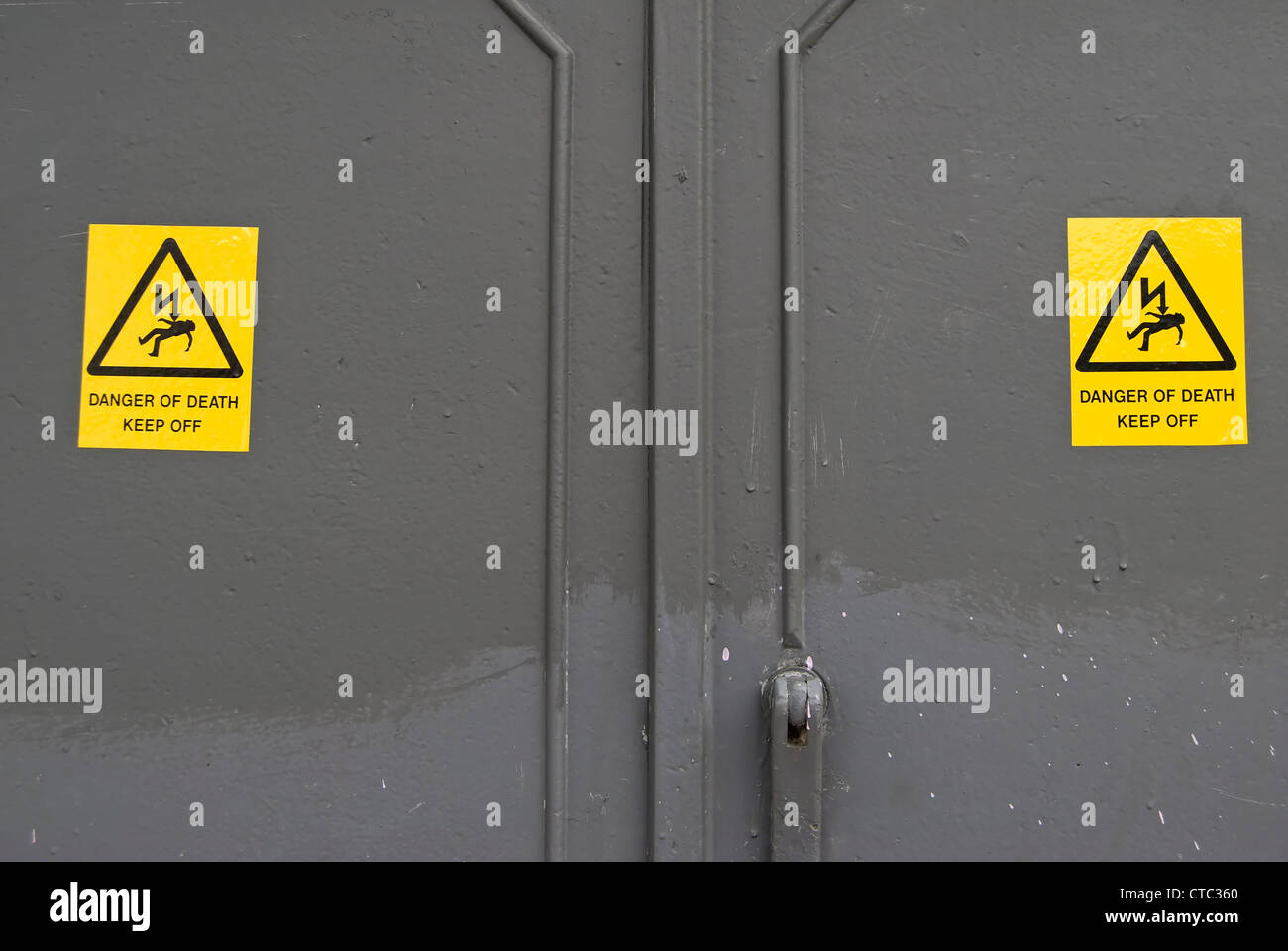danger of death signs on a street electricity cabinet in richmond upon ...