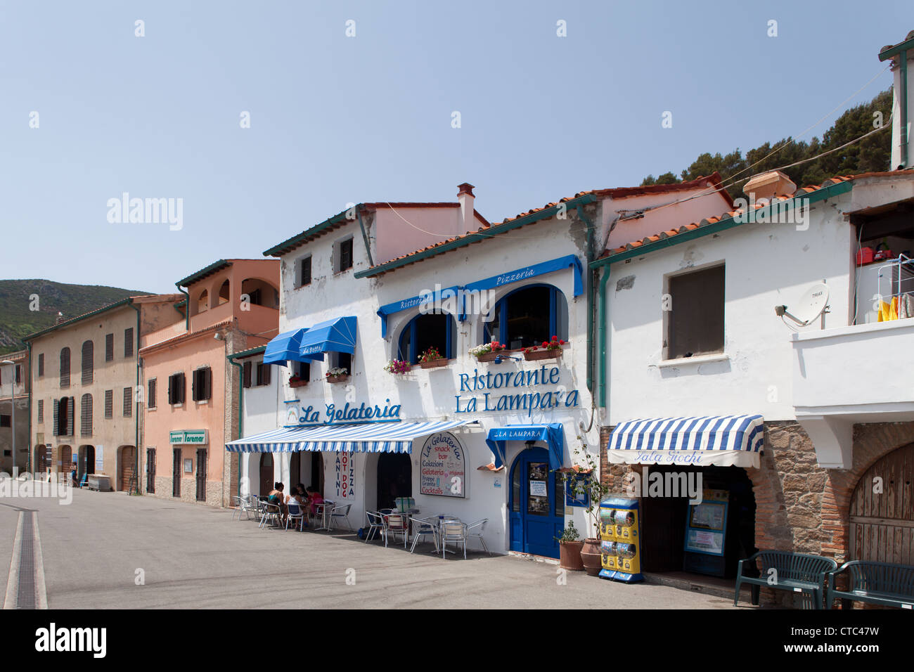 Main street in the harbour of Capraia Island, Tuscan Archipelago, Italy ...