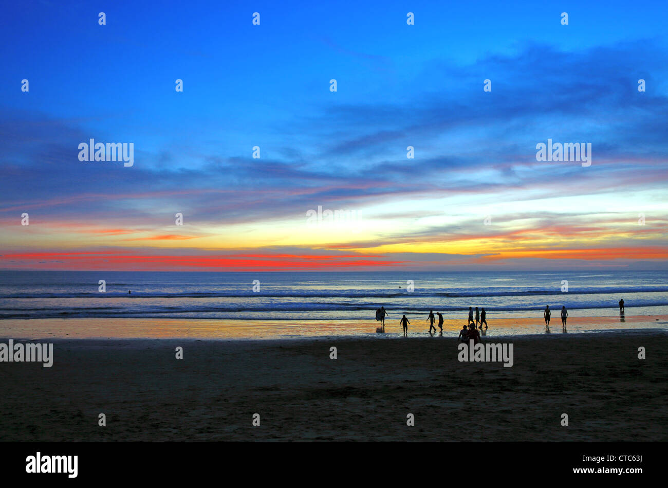 People at sunset on Kuta Beach, Bali Stock Photo - Alamy