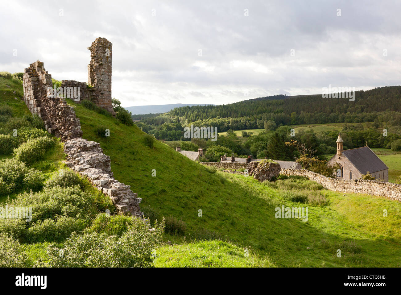 The ruins of Harbottle Castle with the village below, Northumberland ...