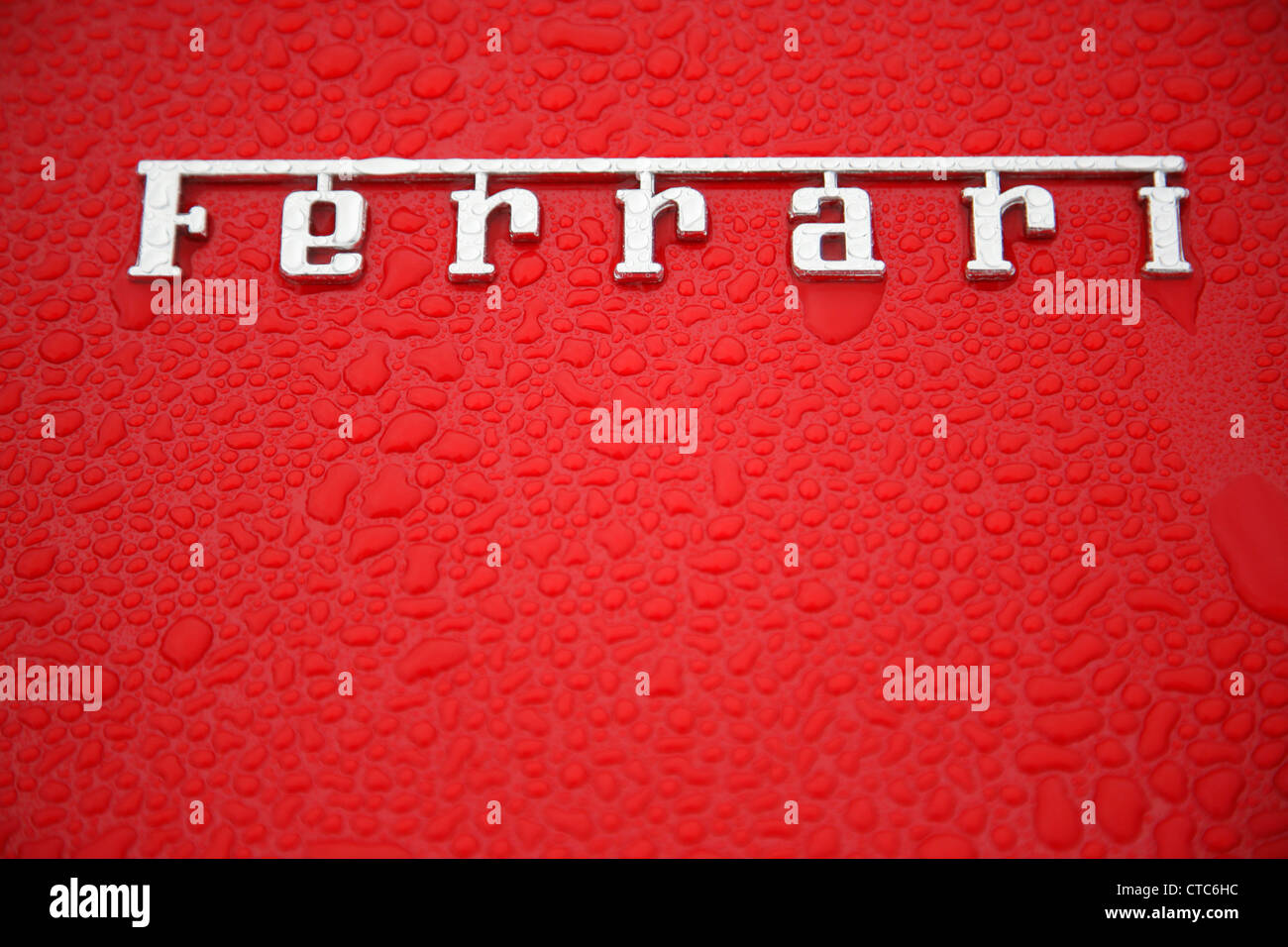 Badge on red Ferrari sportscar Stock Photo - Alamy