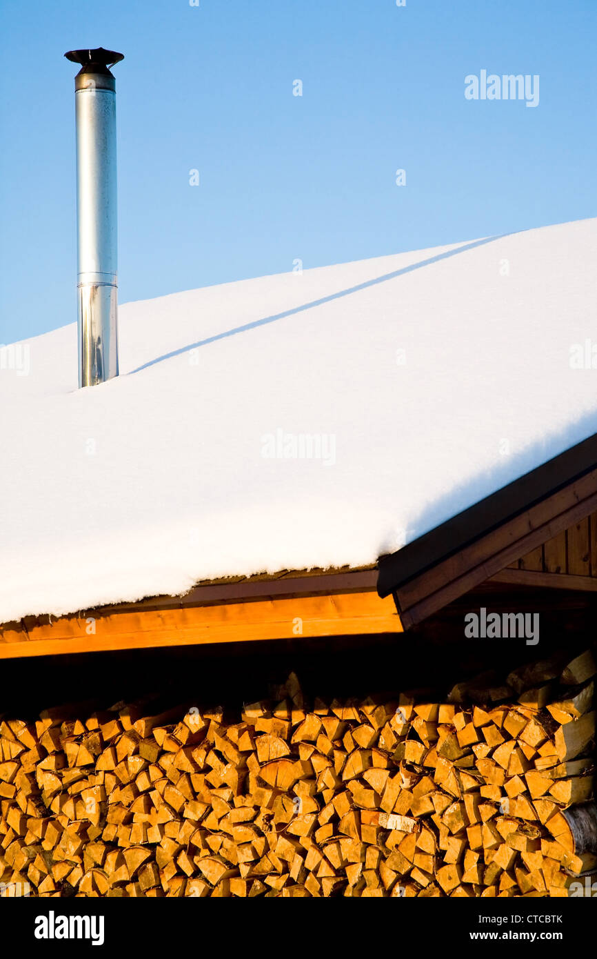 wooden roof of firewood stack shed Stock Photo - Alamy