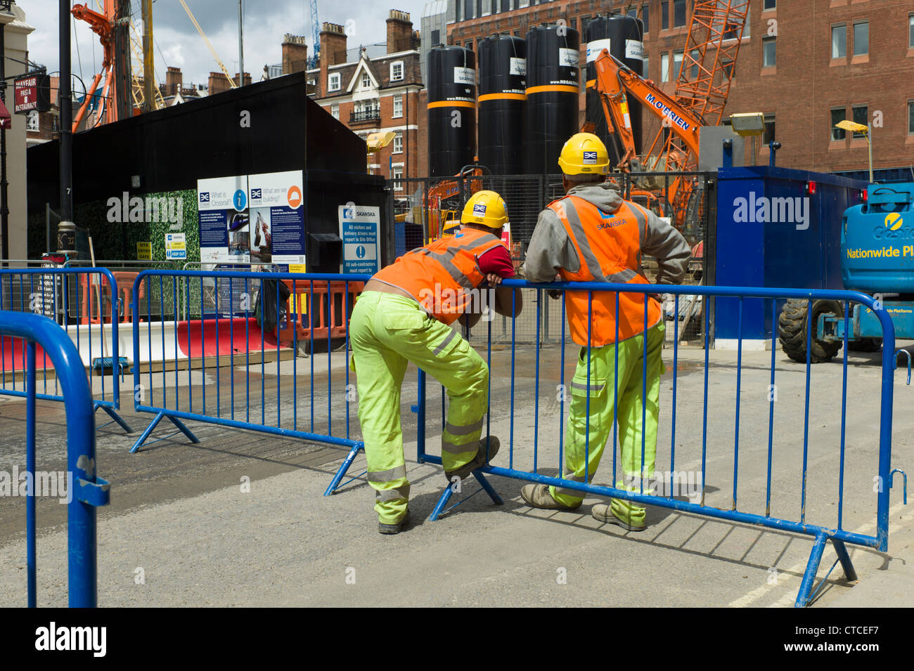 British Construction workers, standing about, Davies Street, London W1 ...