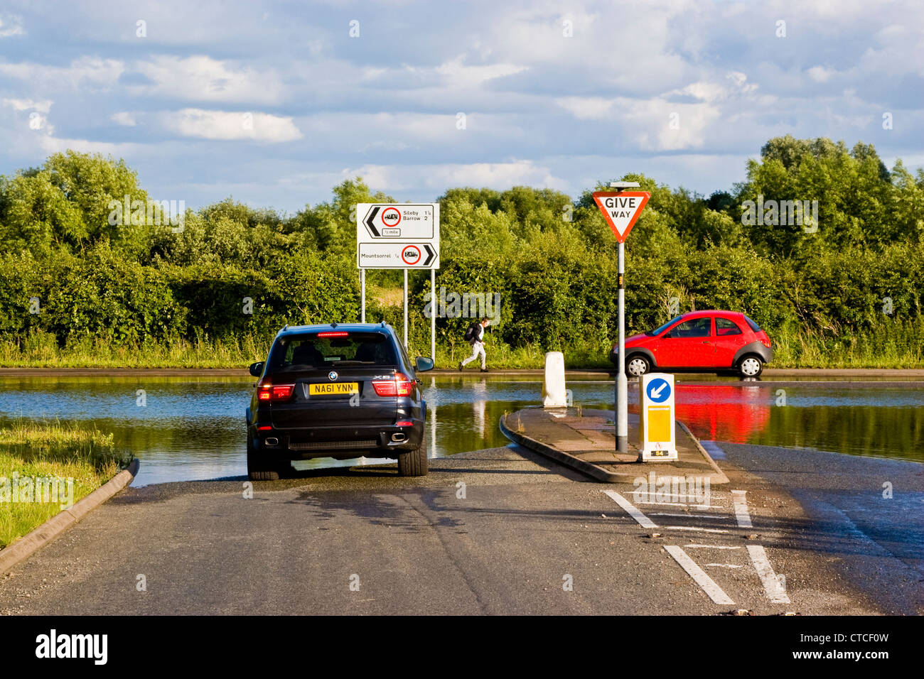 Road Liable Flooding Warning Sign High Resolution Stock Photography and ...