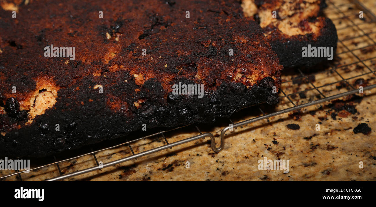 Burnt overcooked cake hi-res stock photography and images - Alamy
