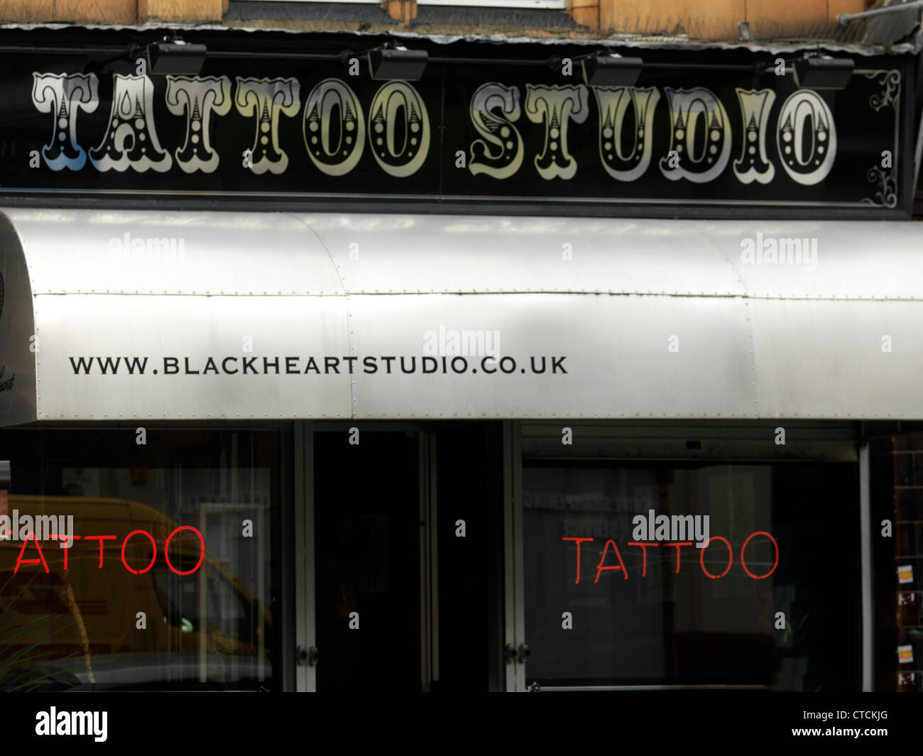 Exterior Of Tattoo Studio Surrey England Stock Photo - Alamy