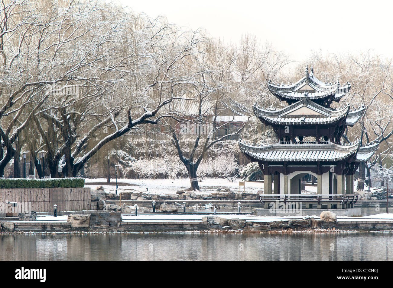Chinese pavilion in the snow, a park of Beijing Stock Photo - Alamy