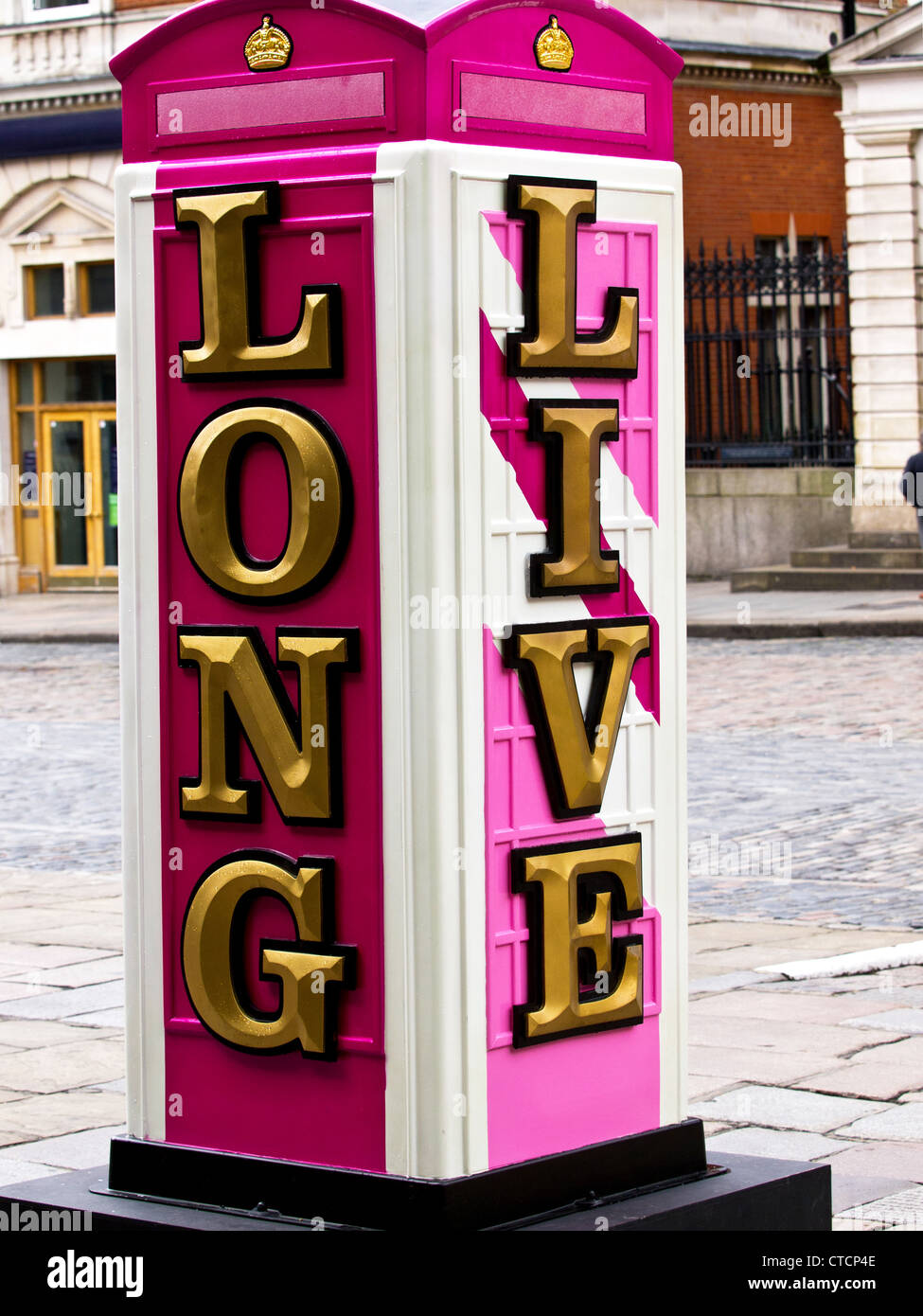 pink love telephone box in Covent garden Stock Photo - Alamy