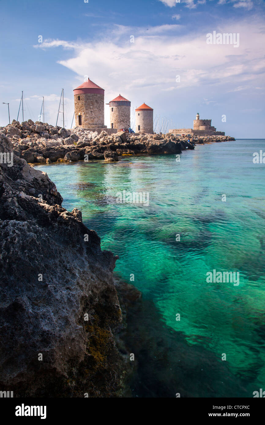 Mandraki Harbour windmills on the Island of Rhodes Greece Stock Photo ...