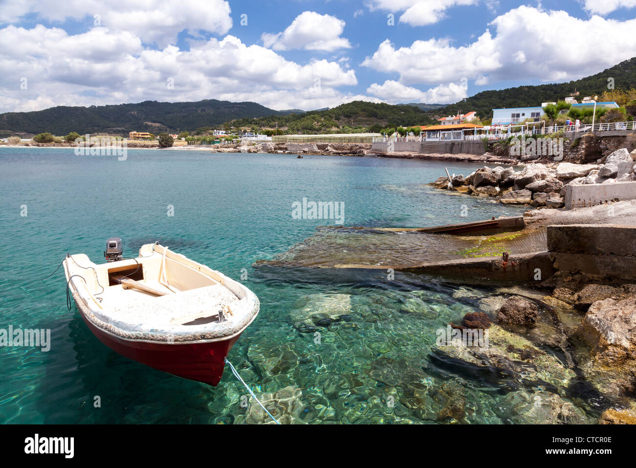Small boats moored at Kamiros Skala dock, Rhodes Greece Stock Photo - Alamy