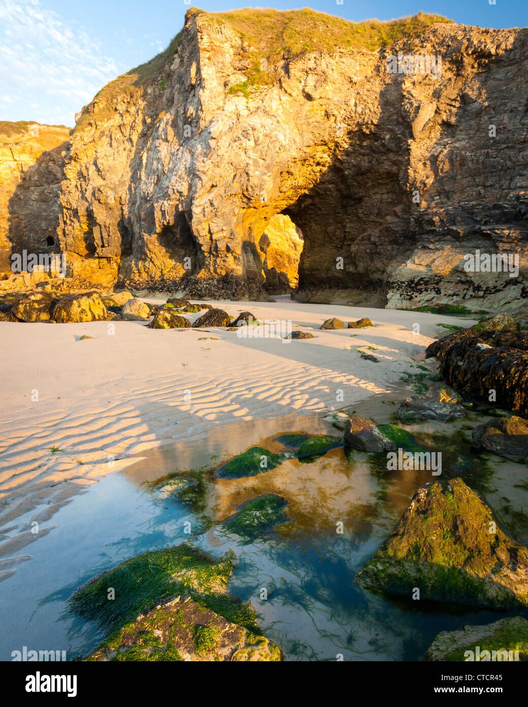 Colourful cliffs and rock arch at Droskyn on Perranporth Cornwall ...