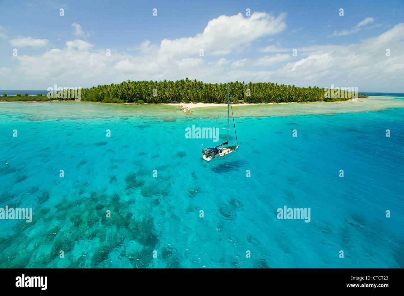 sailing vessel on the anchorage of Suwarrow atoll, Cook Islands Stock ...