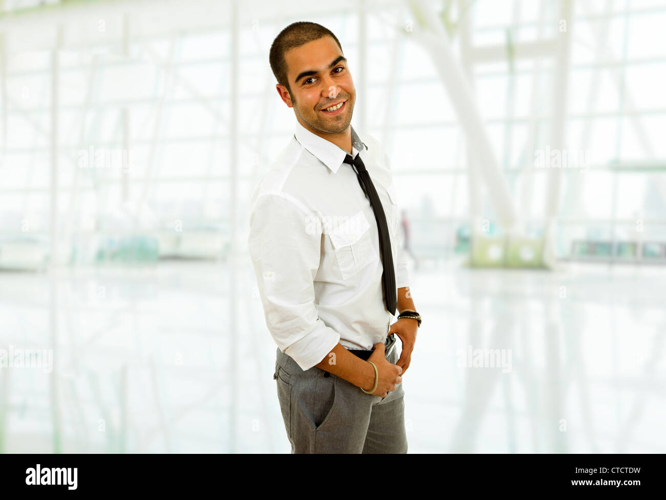 young happy business man at the office Stock Photo - Alamy