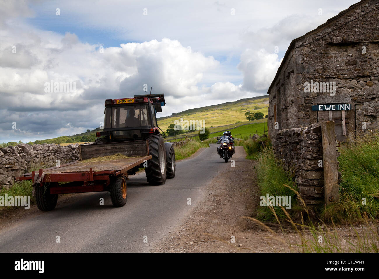 Farm vehicle passing Ewe Inn accommodation Sign; Funny Sign, humorous ...