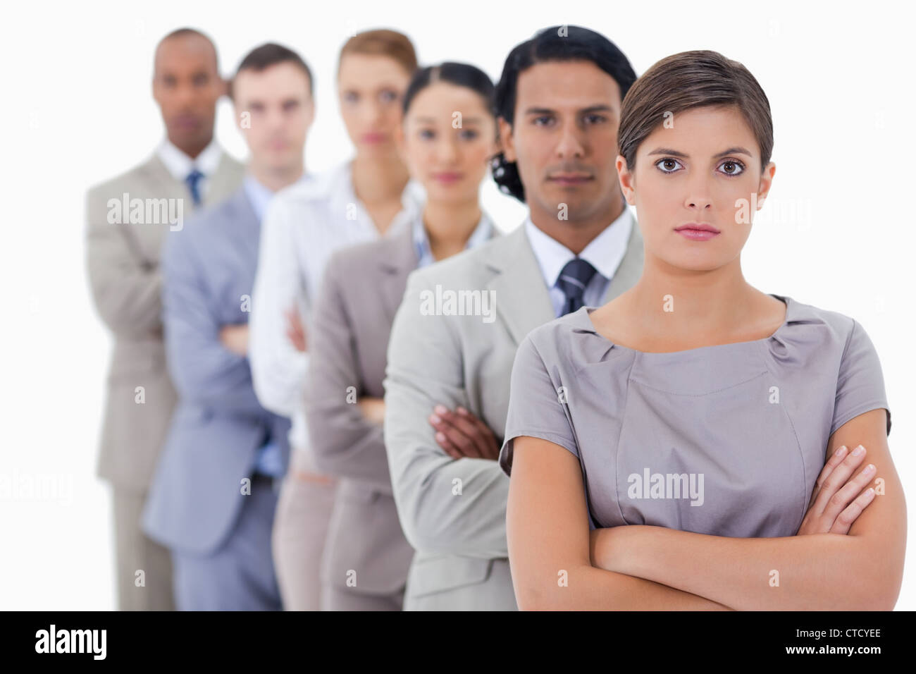 Big close-up of serious workmates in a single line Stock Photo - Alamy