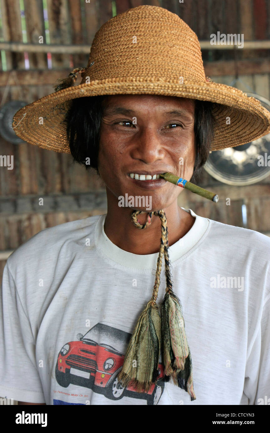 Portrait of burmese man smoking cheroot cigar, Inle lake, Shan state ...