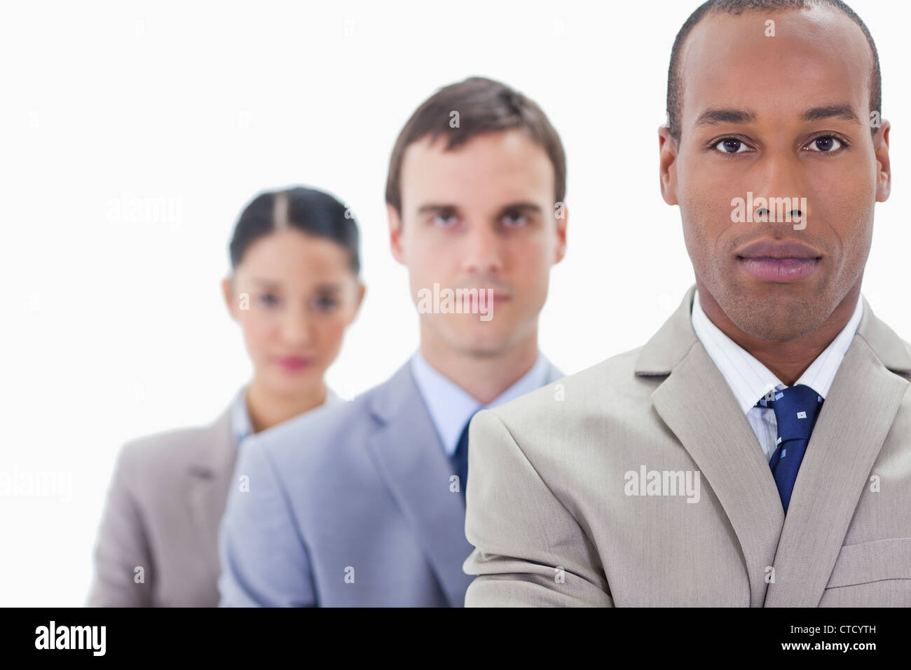 Big close-up of a business team in a single line looking straight Stock ...