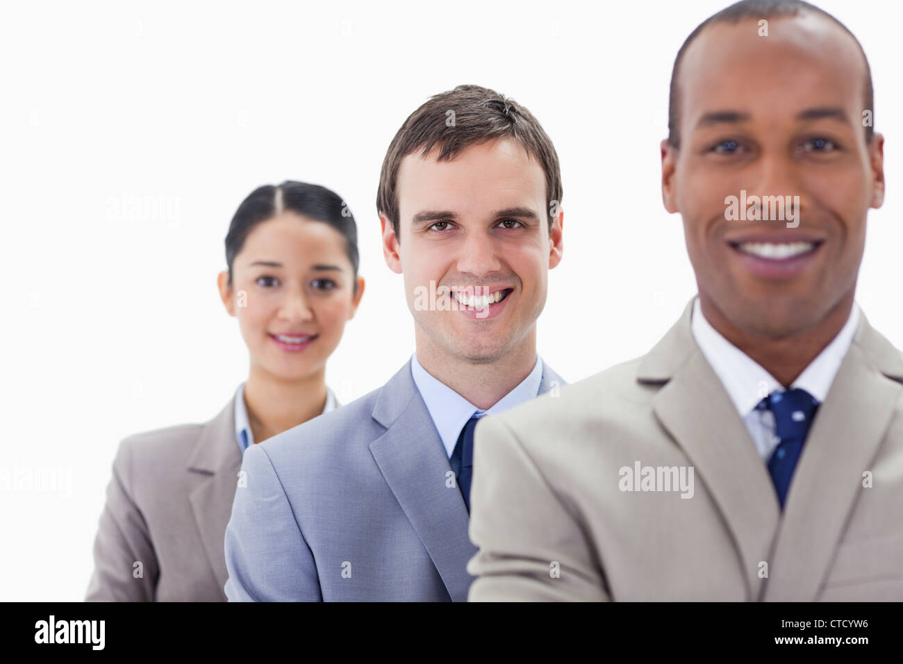 Big close-up of colleagues smiling in a single line Stock Photo - Alamy