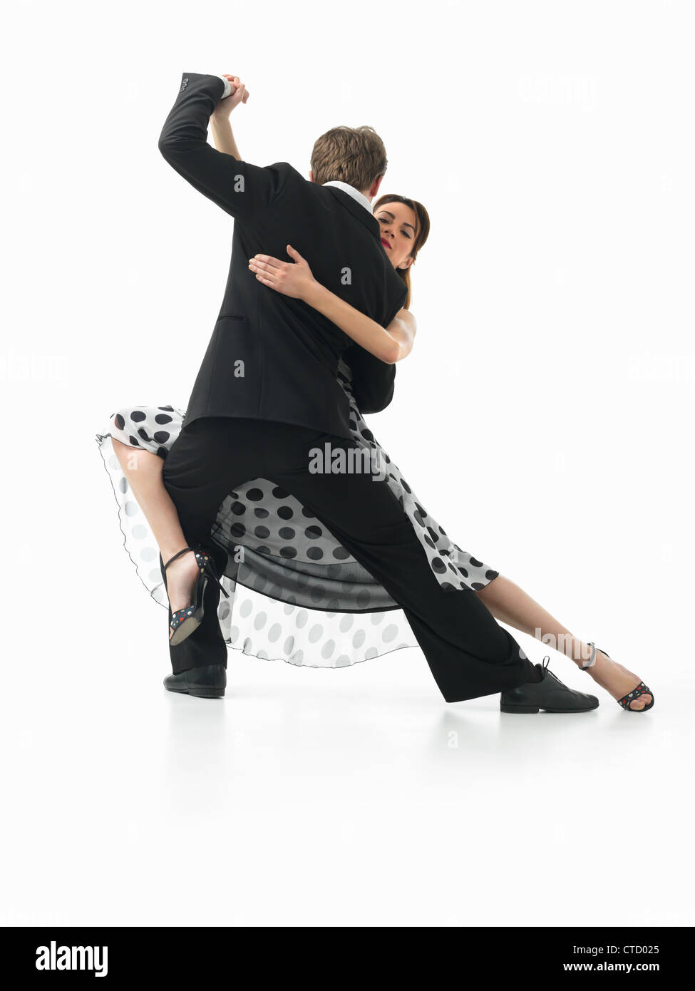 passionate, young couple showing dance moves on white background Stock ...