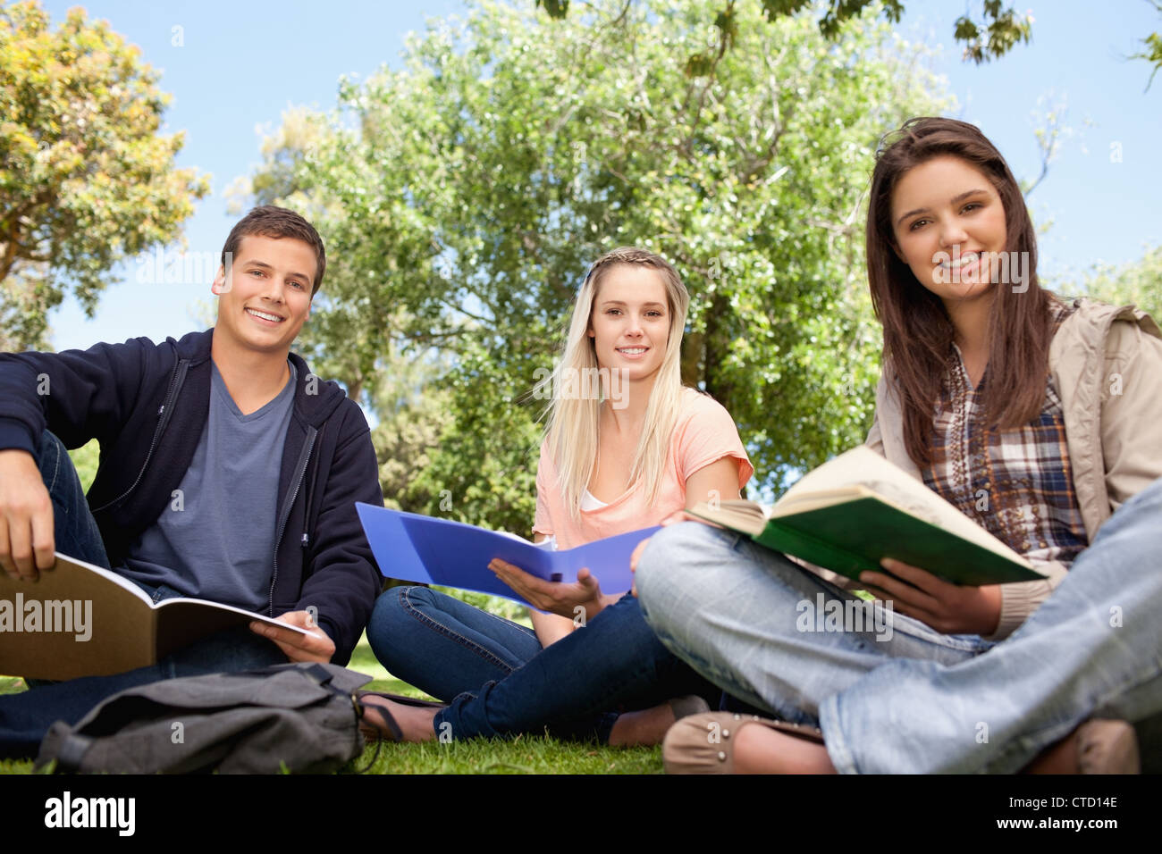 Low angle-shot of young people working Stock Photo - Alamy