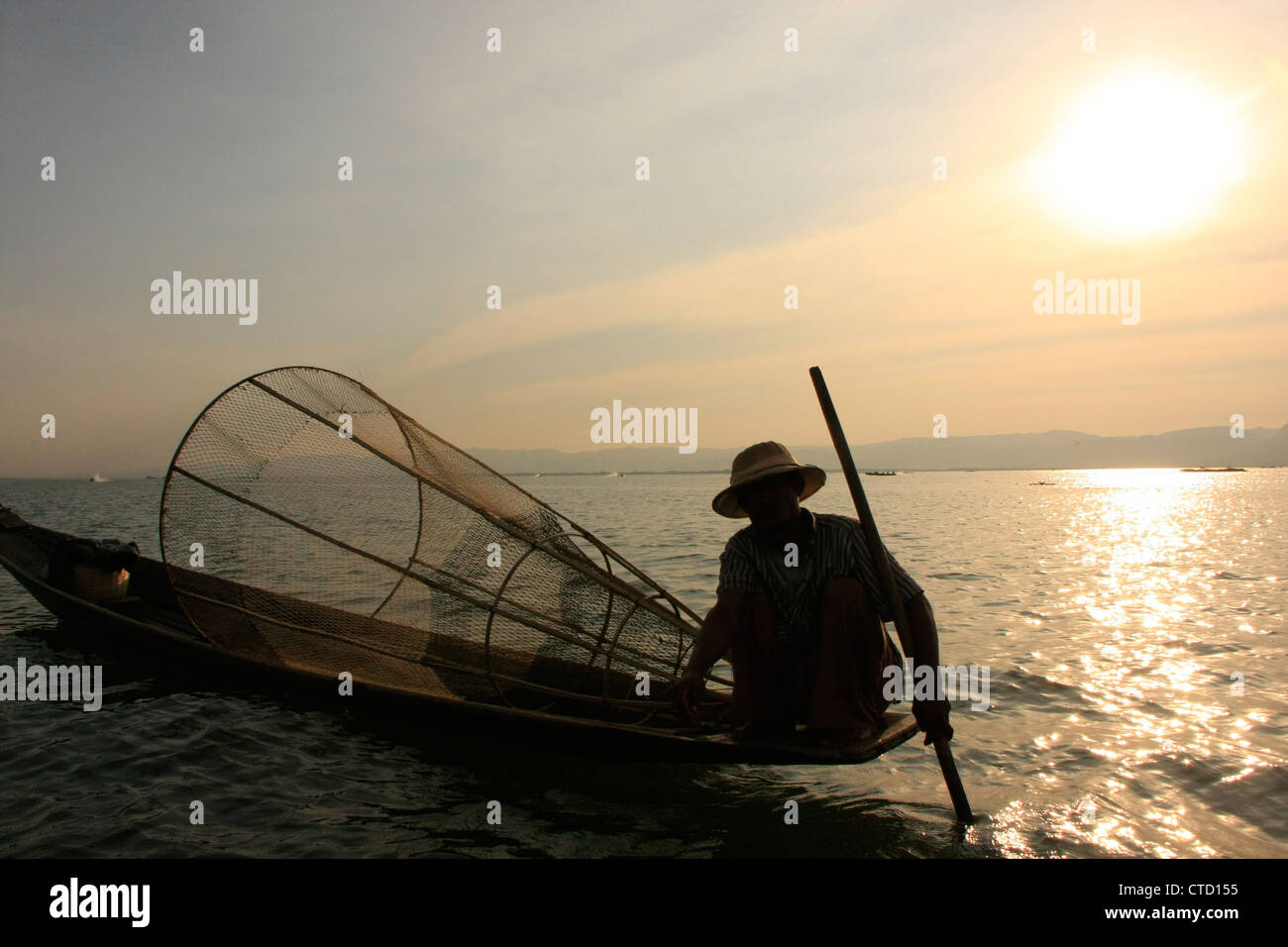 Inle lake fisherman at sunset, Shan state, Myanmar, Southeast Asia ...